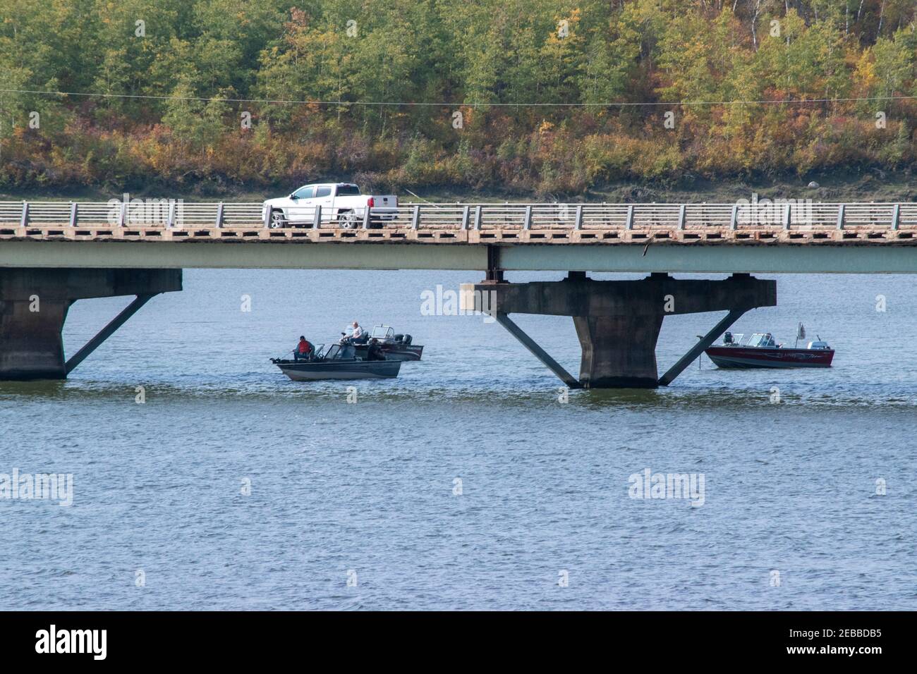 Boaters under the bridge that crosses the Shellmouth Reservoir, also ...