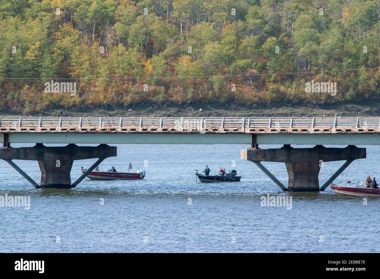 Boaters under the bridge that crosses the Shellmouth Reservoir, also ...
