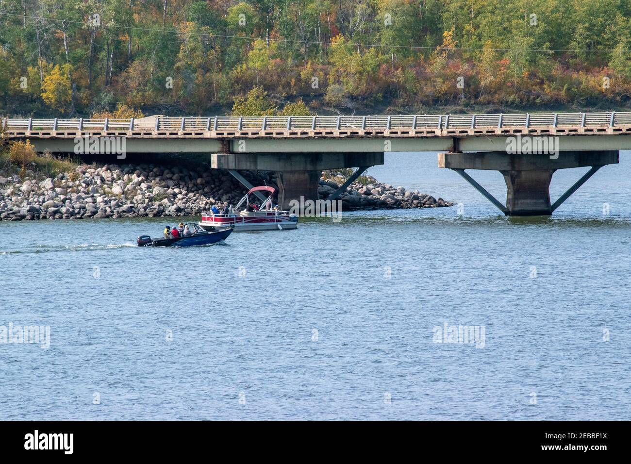 Boaters under the bridge that crosses the Shellmouth Reservoir, also ...