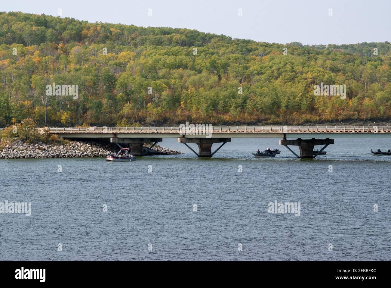 Boaters under the bridge that crosses the Shellmouth Reservoir, also ...