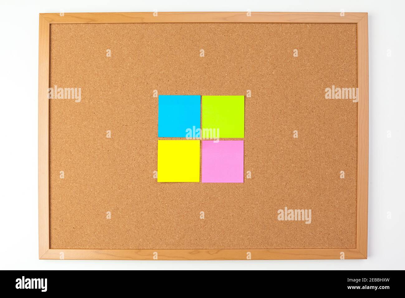 Cork board with several colorful blank notes with pins Stock Photo - Alamy