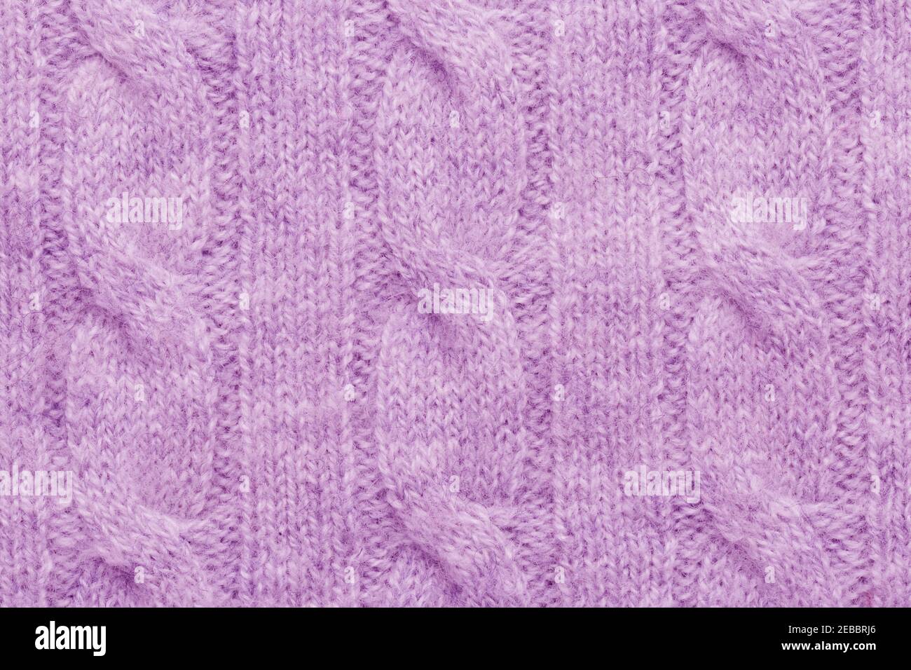 Purple knitted fabric hi-res stock photography and images - Alamy