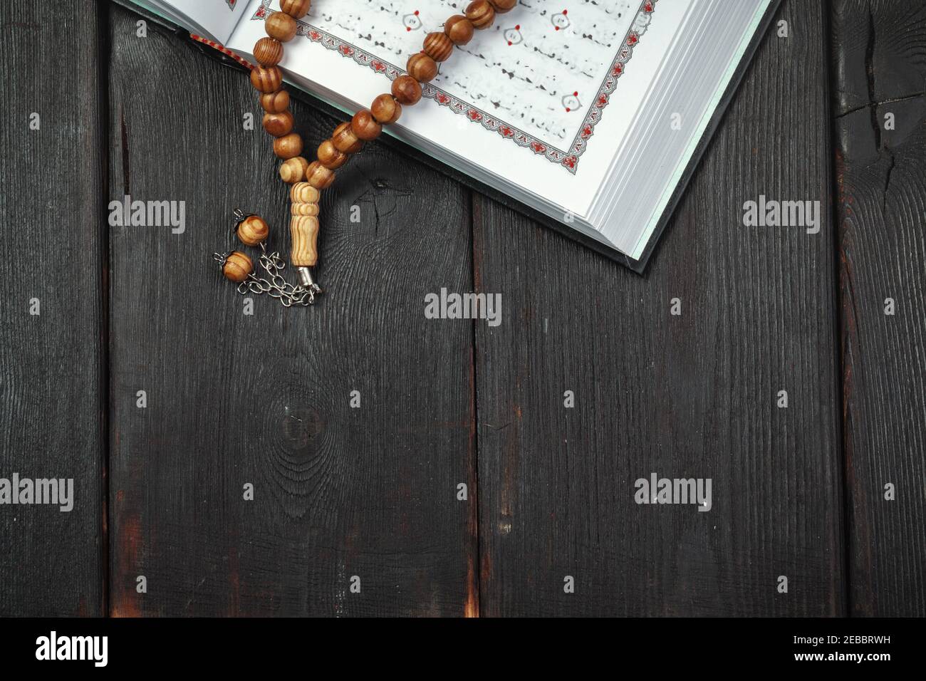 The Open holy Quran with tasbih/rosary beads close up Stock Photo - Alamy