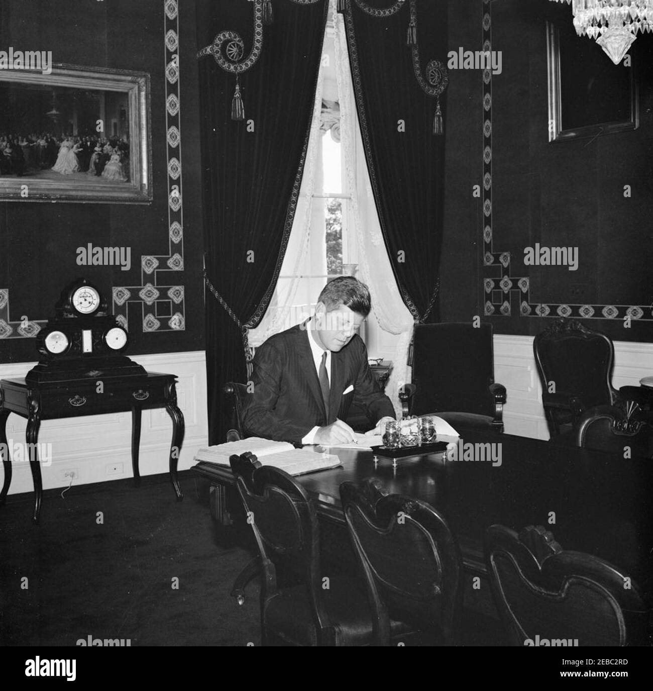 President Kennedy in the Treaty Room. President John F. Kennedy signs a ...