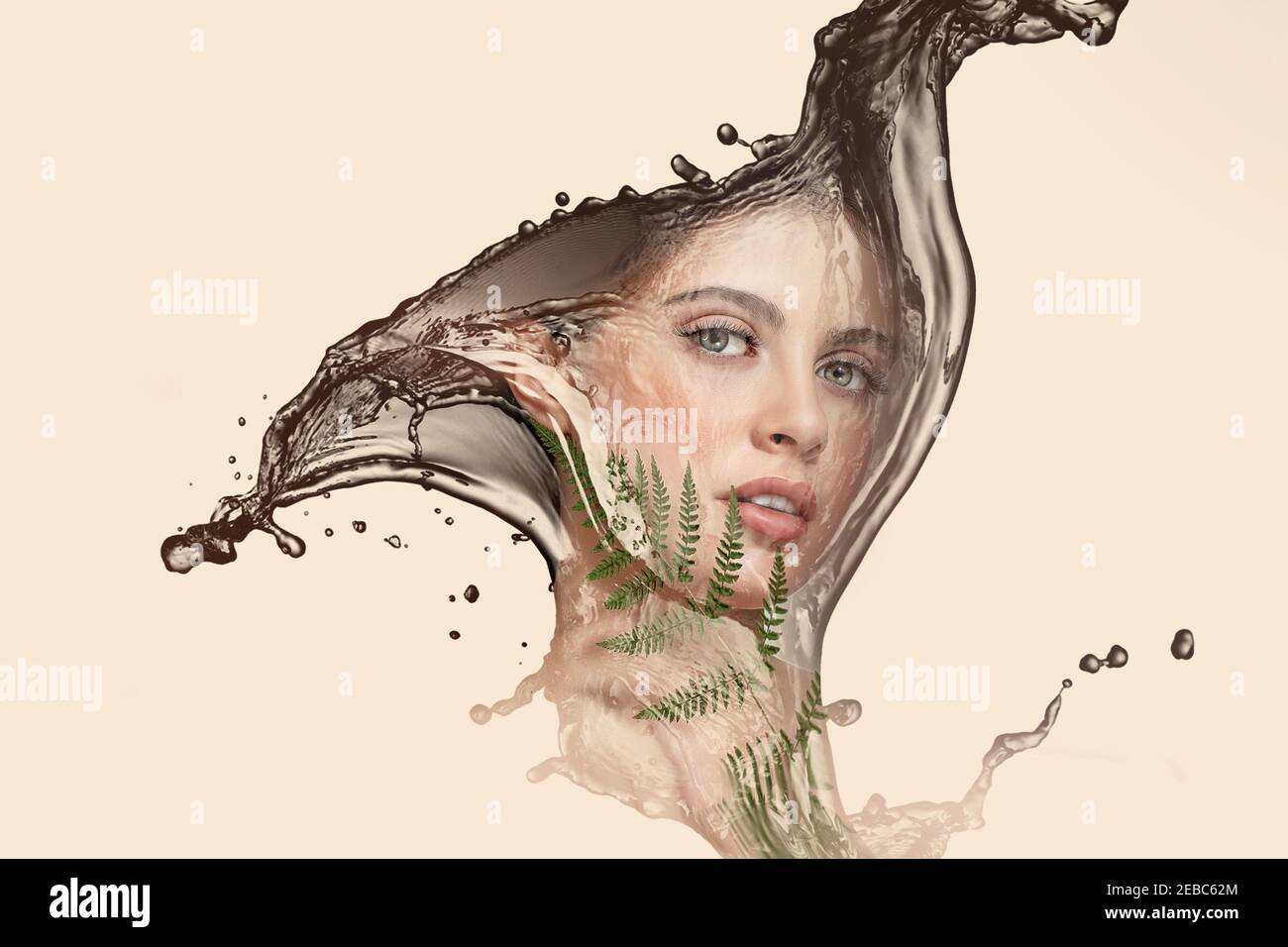 Reflection of a beautiful brunette girl in a water splash on a beige ...