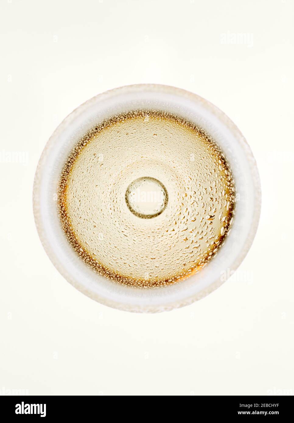 overhead view of white wine or champagne in a glass Stock Photo - Alamy