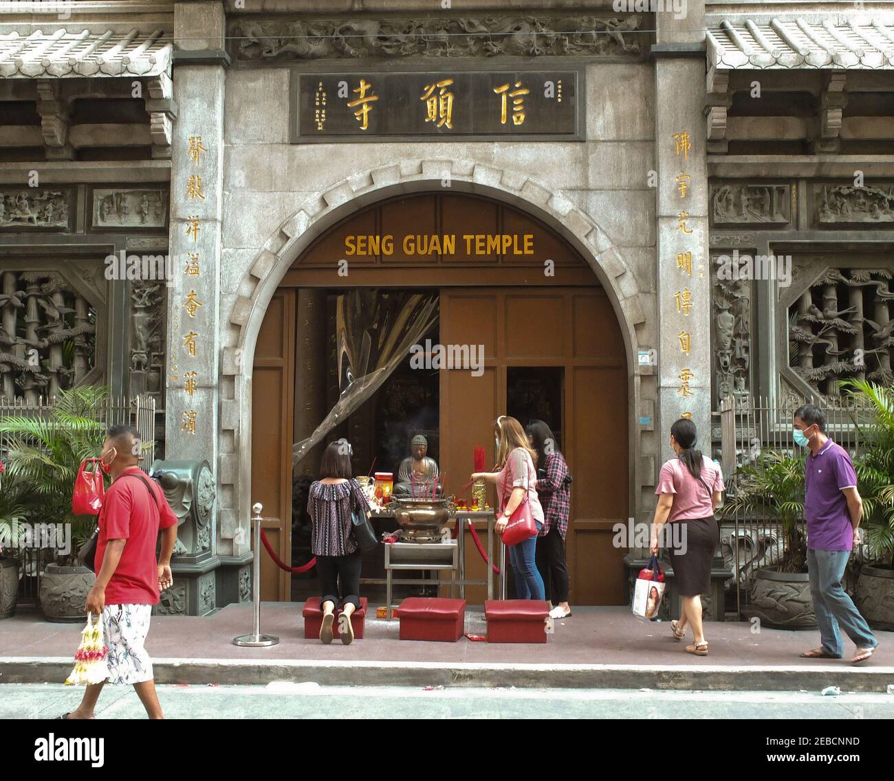 The Filipino Chinese Community preparing to enter the Seng Guan Temple ...