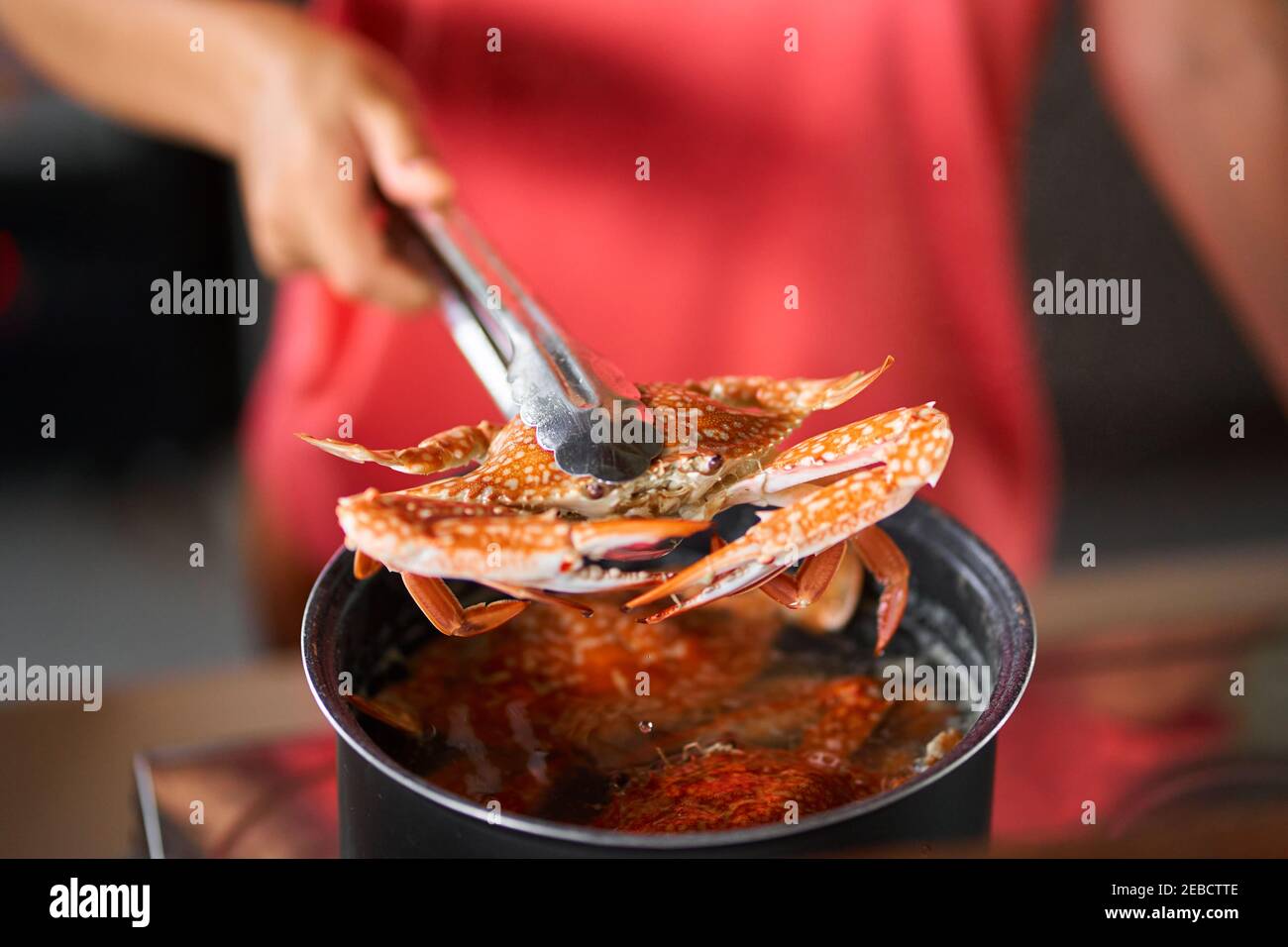 Woman boiling sea water hi-res stock photography and images - Alamy