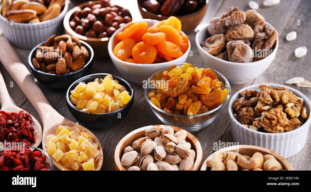 Composition with dried fruits and assorted nuts. Delicacies Stock Photo ...