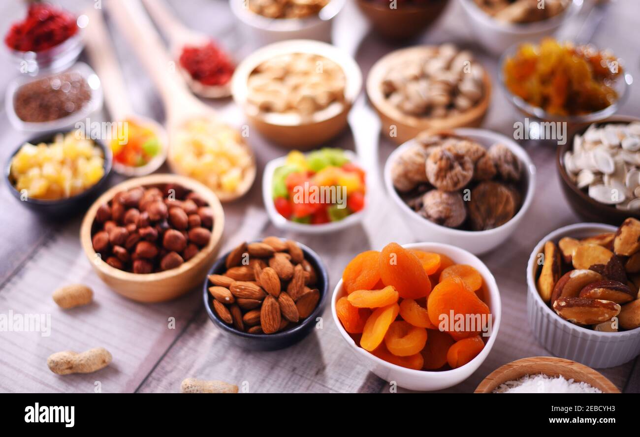 Composition with dried fruits and assorted nuts. Delicacies Stock Photo ...