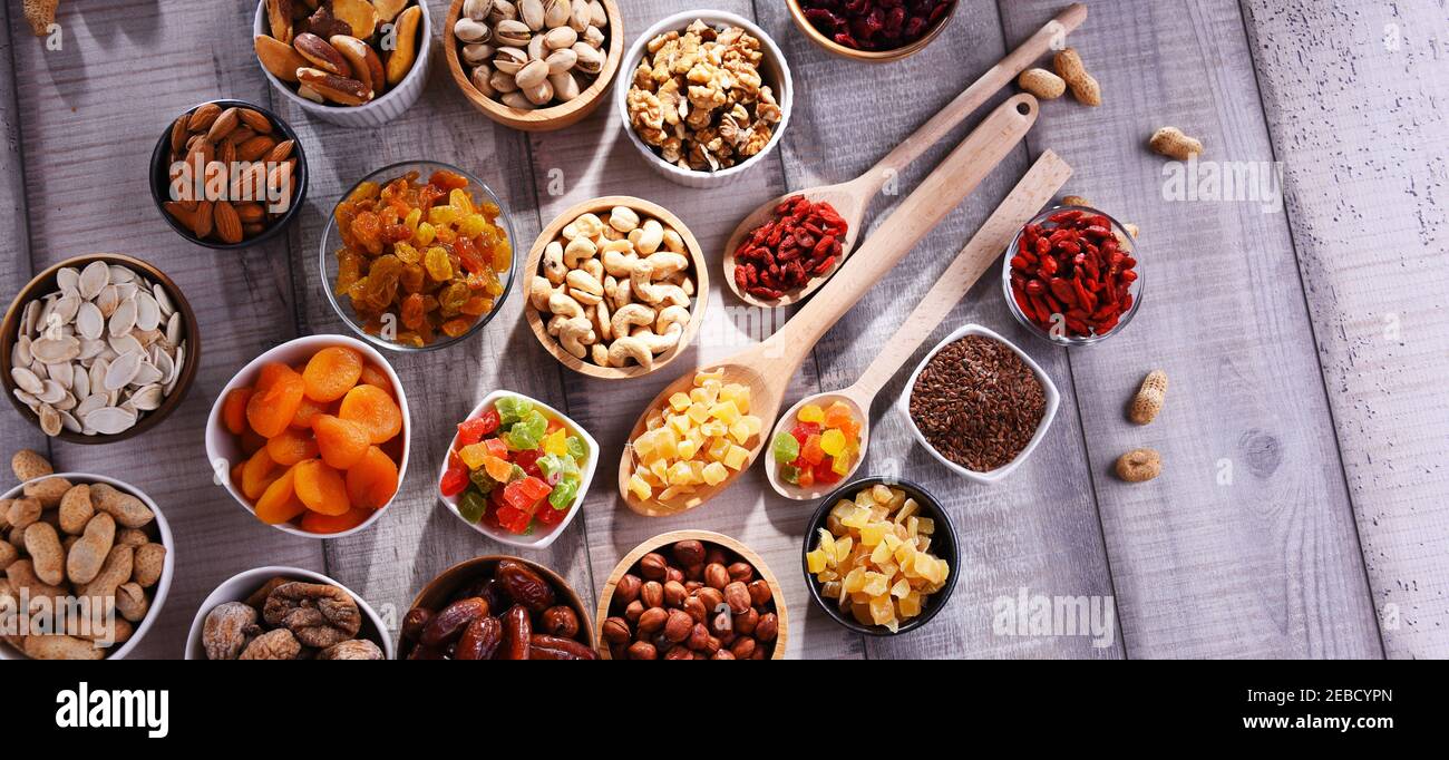 Composition with dried fruits and assorted nuts. Delicacies Stock Photo ...