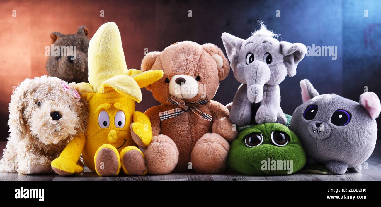 Group of stuffed animal toys in a children's room Stock Photo - Alamy