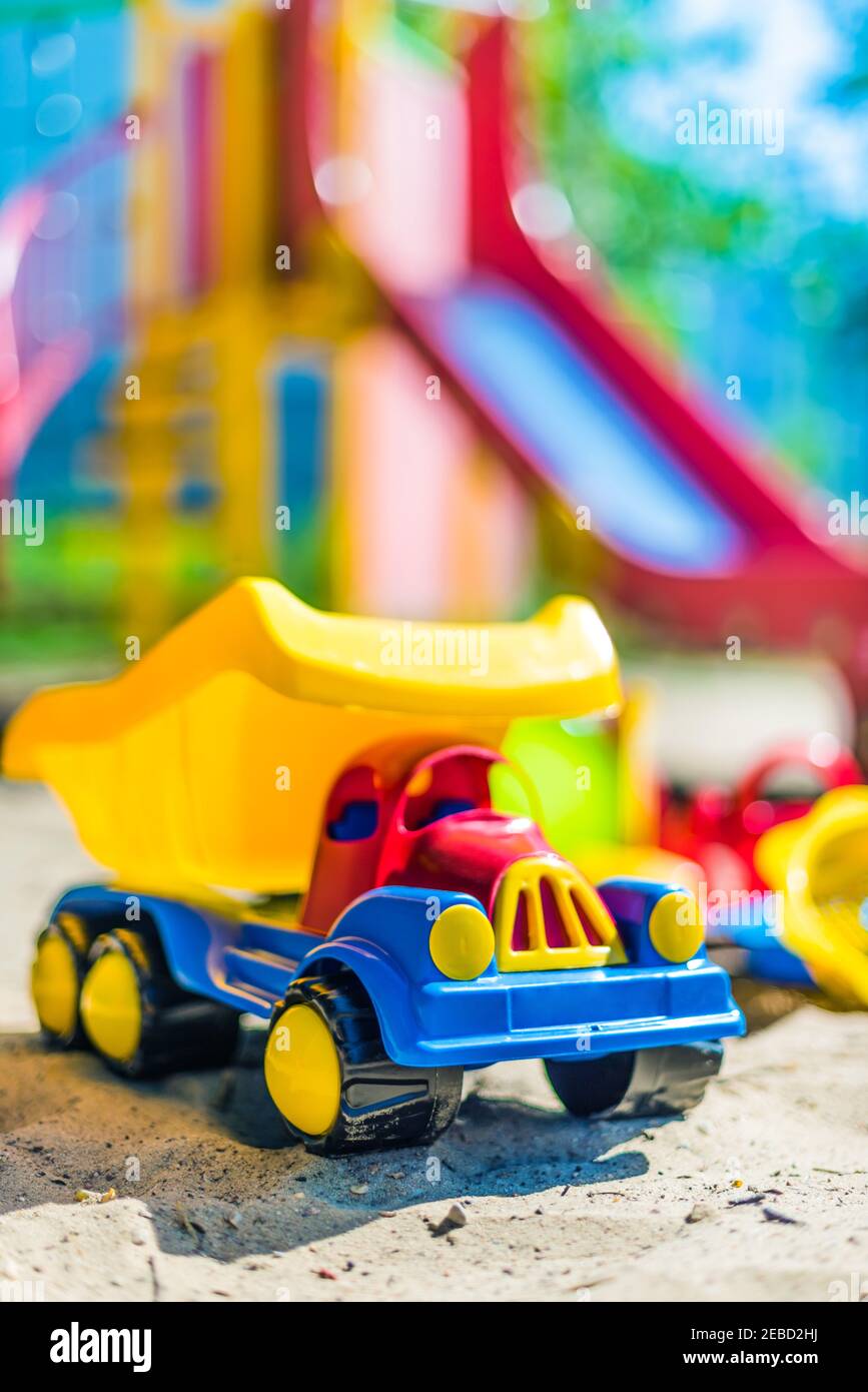 Colorful plastic children toys on the playground Stock Photo - Alamy