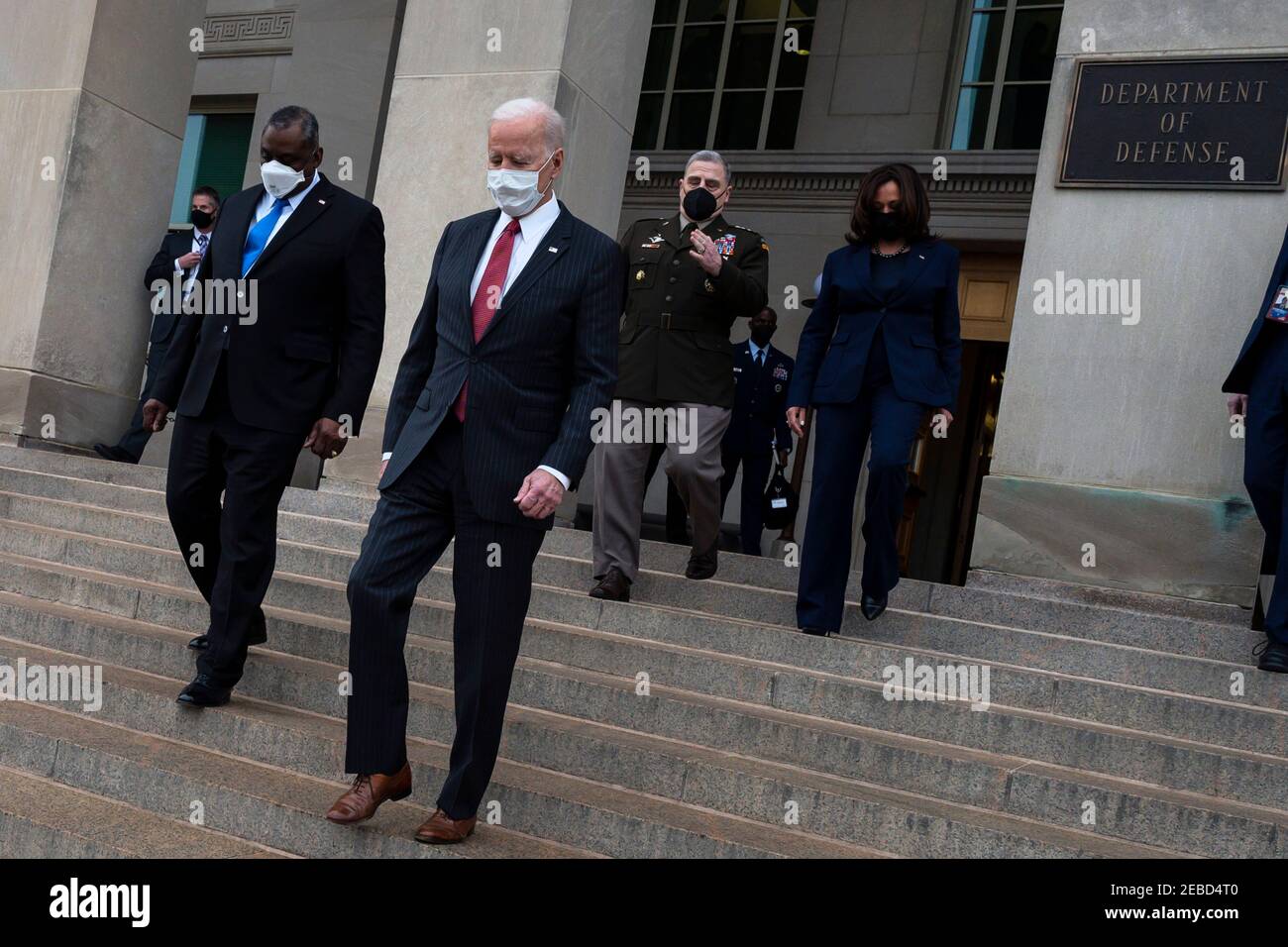 U.S. President Joe Biden walks with Vice President Kamala Harris ...
