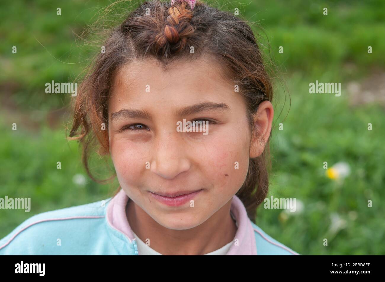 5-16-2018. Lomnicka, Slovakia. A close-up of a Roma or Gypsy girl in an ...