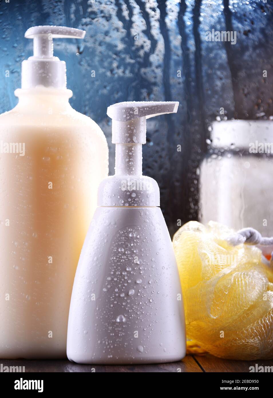 Different containers of body care products in the bathroom Stock Photo ...