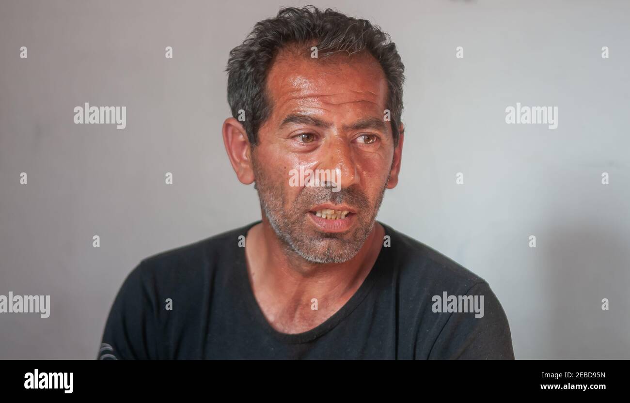 5-16-2018. Lomnicka, Slovakia. A close-up of a Roma or Gypsy male in an ...