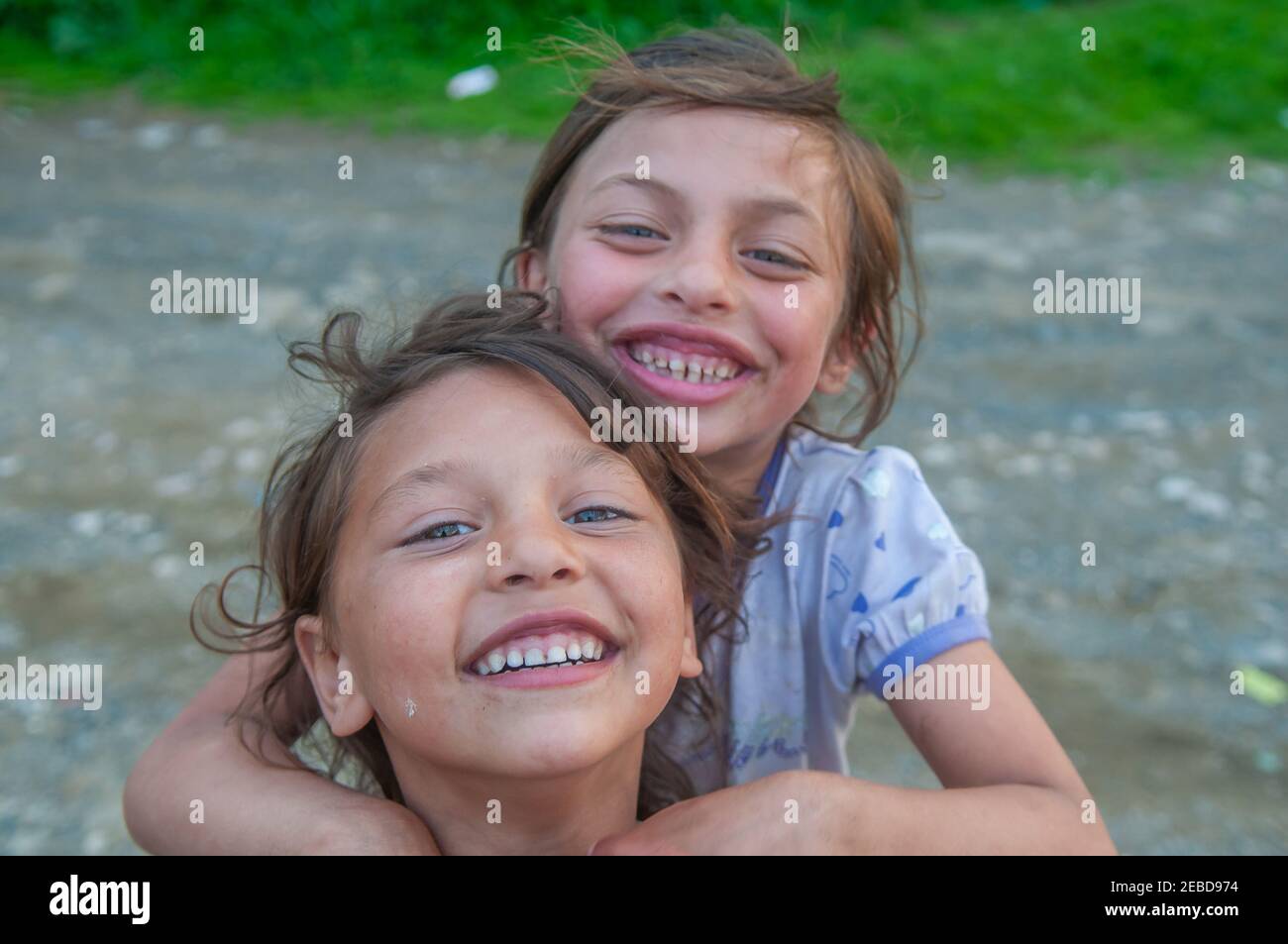 5-16-2018. Lomnicka, Slovakia. A close-up of two Roma or Gypsy girls in ...