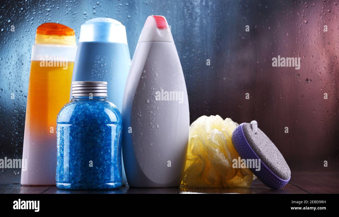 Different containers of body care products in the bathroom Stock Photo ...