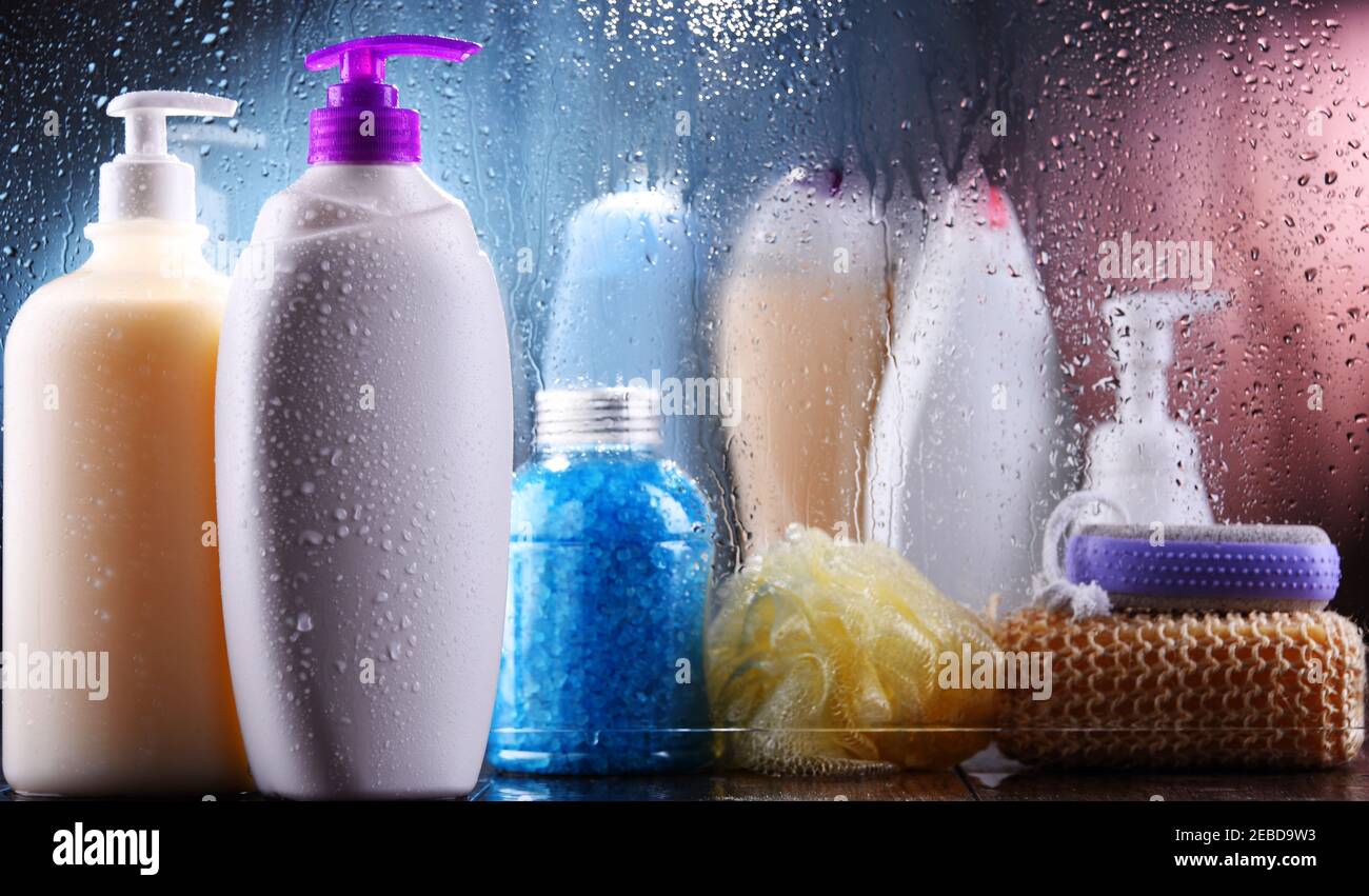 Different containers of body care products in the bathroom Stock Photo ...