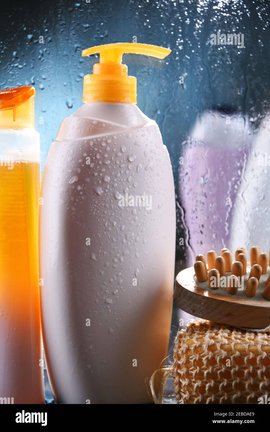 Different containers of body care products in the bathroom Stock Photo ...