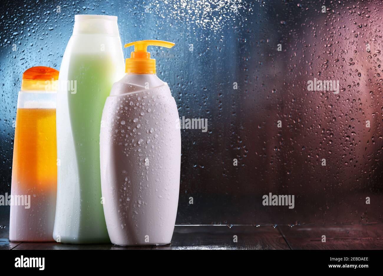 Different containers of body care products in the bathroom Stock Photo ...