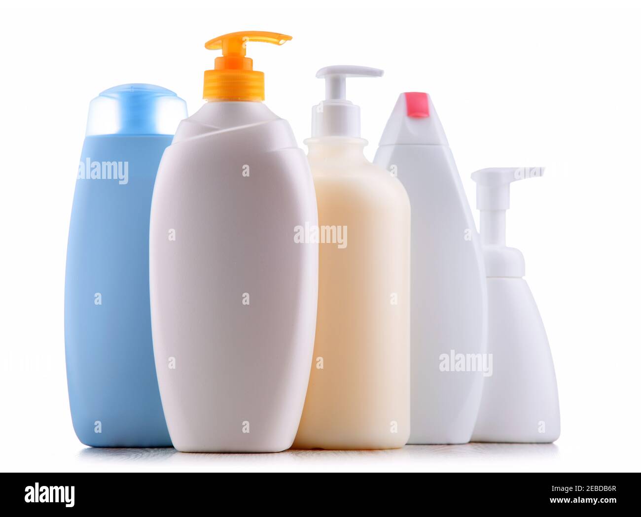Plastic contaiers of shampoos and shower gels isolated on white ...