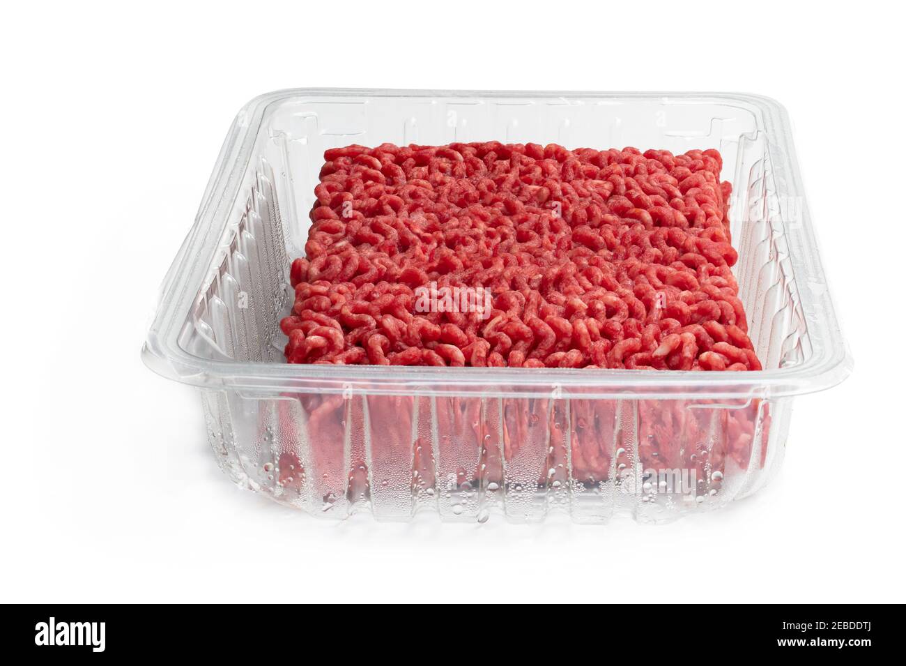 Raw minced beef in plastic pack isolated on white Stock Photo - Alamy