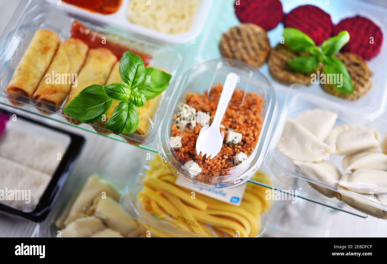 A variety of prepackaged food products in plastic boxes Stock Photo - Alamy