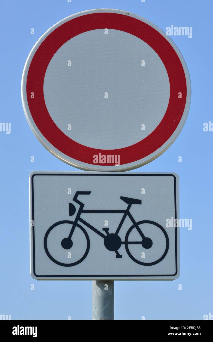Vertical shot of a traffic sign indicating no vehicles except bicycles ...