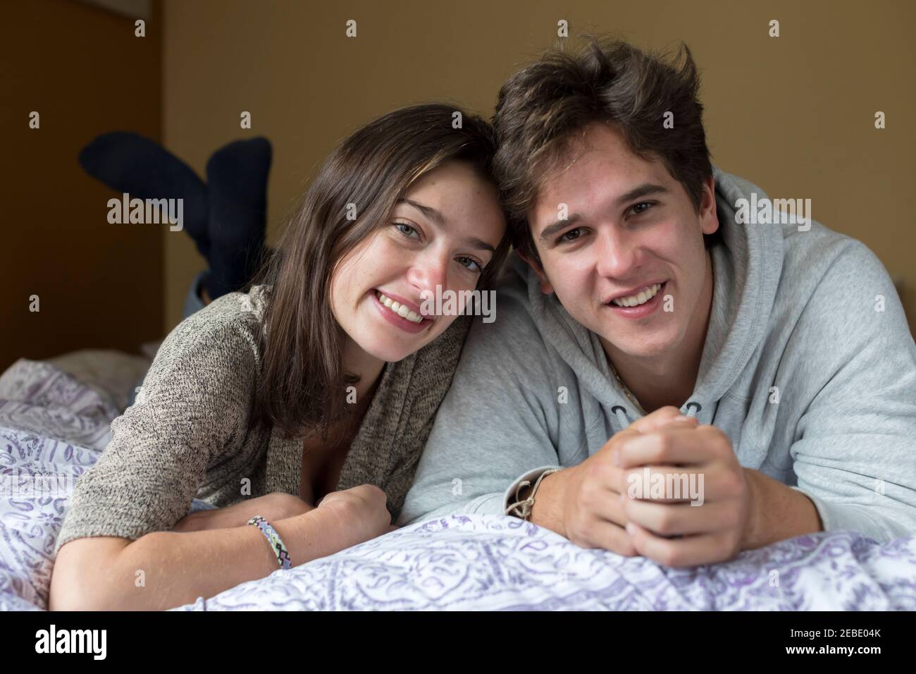 Couple sharing a bed hi-res stock photography and images - Alamy