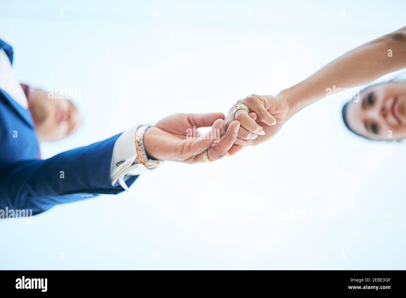 newly married couple holding hands in a bottom-up position Stock Photo ...