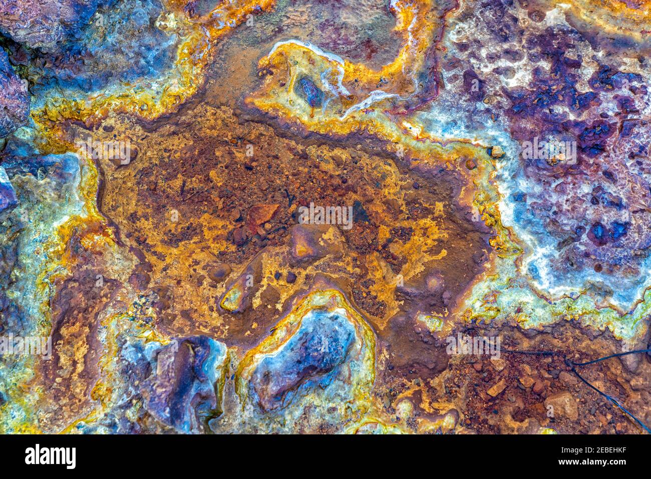A top down abstract view of a riverbed in an abandoned mining area with ...