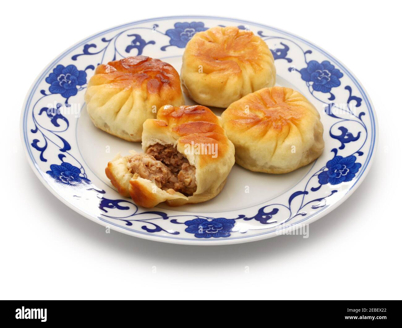 homemade shui jian bao, taiwanese pan fried pork buns isolated on white ...