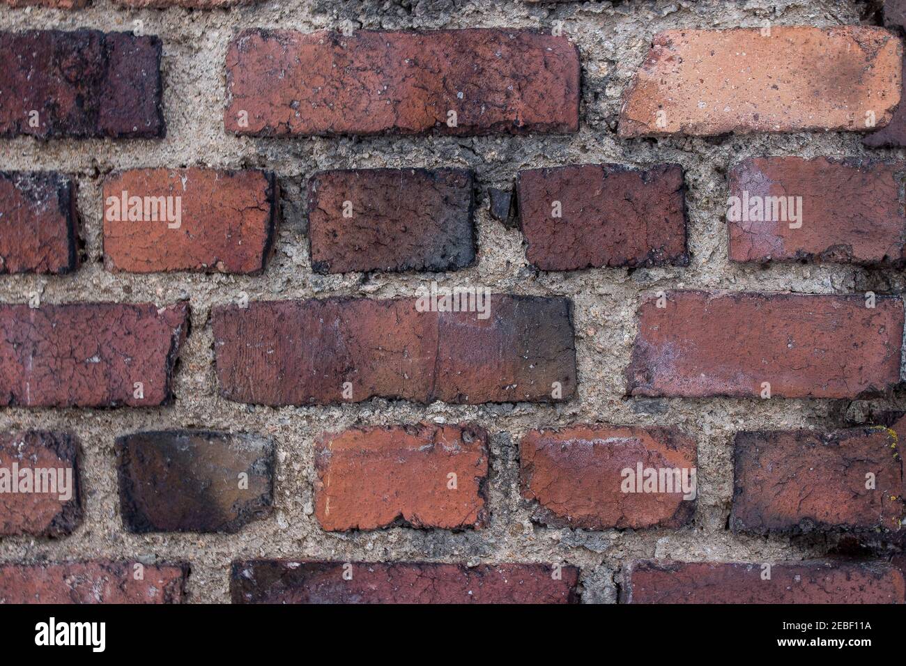 old rustic brick wall red shades background Stock Photo - Alamy