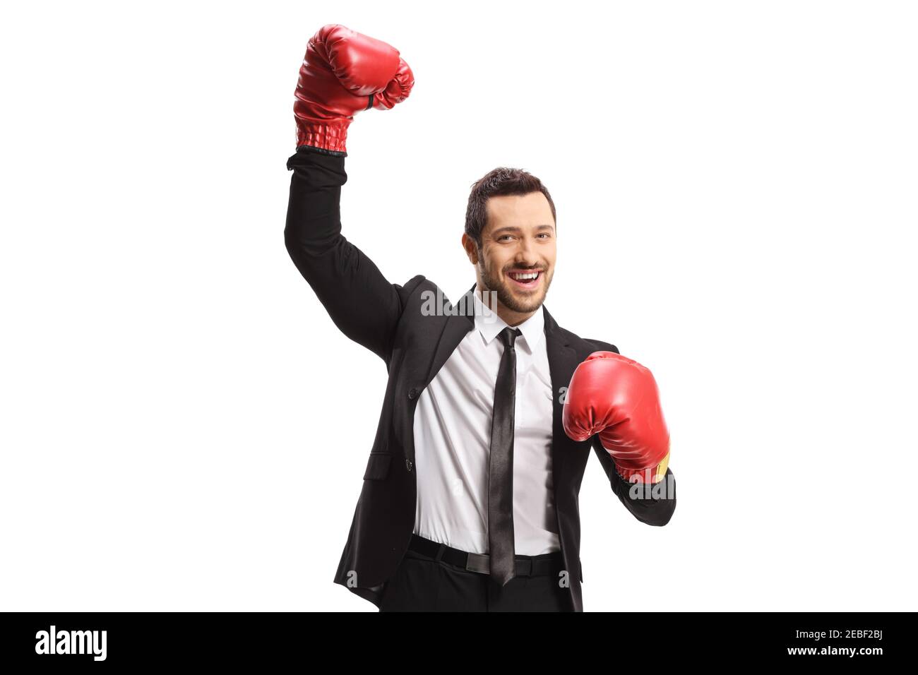 Businessman with boxing gloves raising one hand as a winner isolated on ...