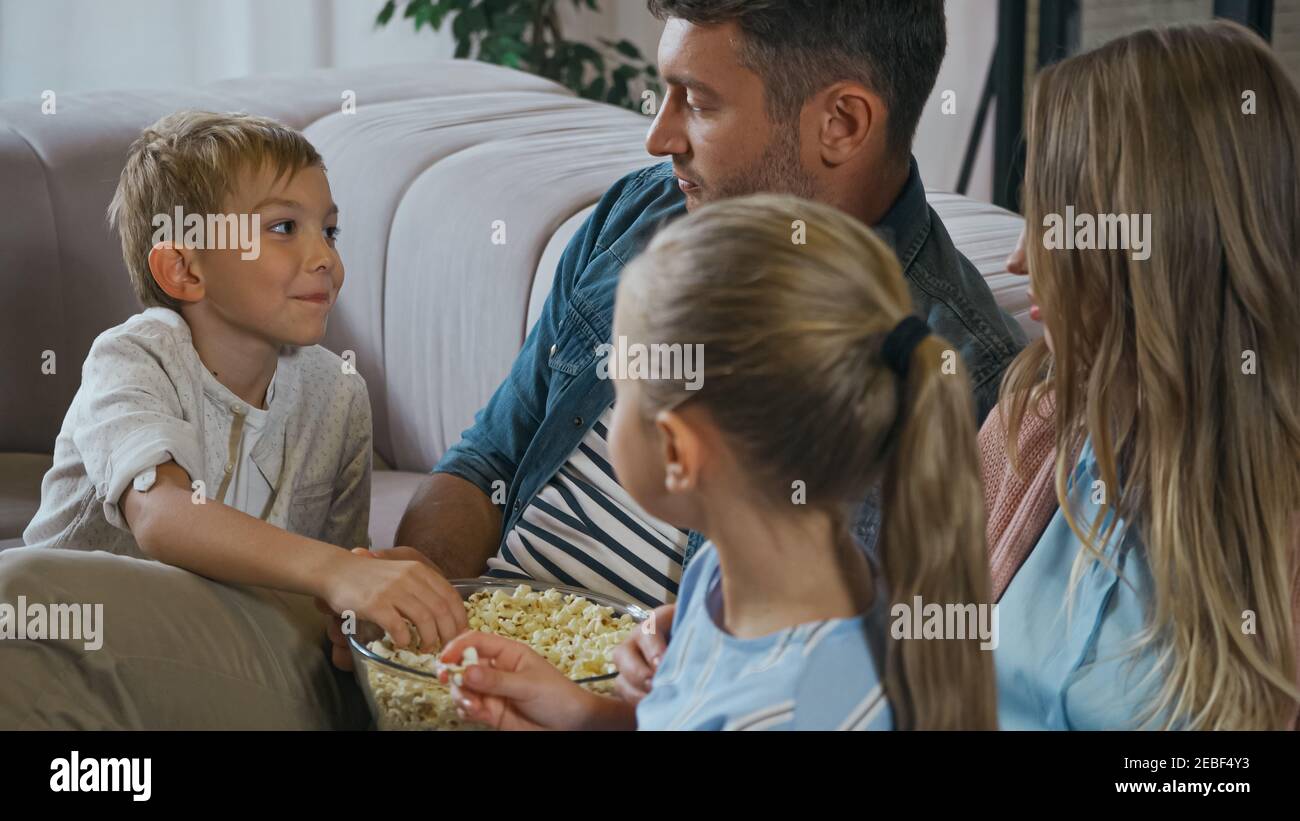 Woman taking delicious popcorn hi-res stock photography and images - Alamy