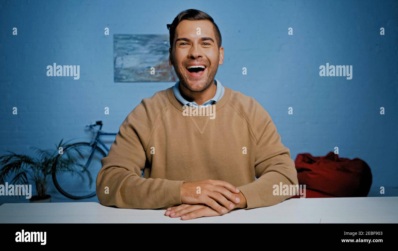 Excited man laughing hi-res stock photography and images - Alamy