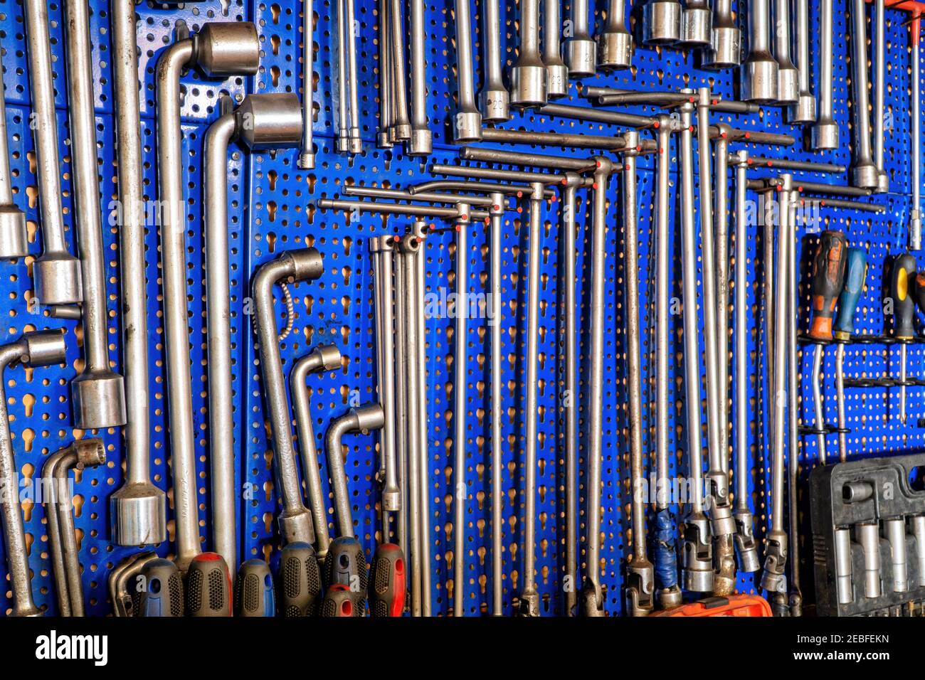 A range of used mechanic tools, from combination wrenches to ...