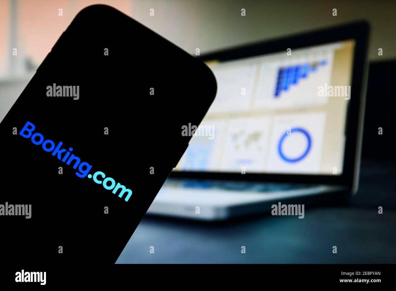 In this photo illustration a Booking.com app logo seen displayed on a ...