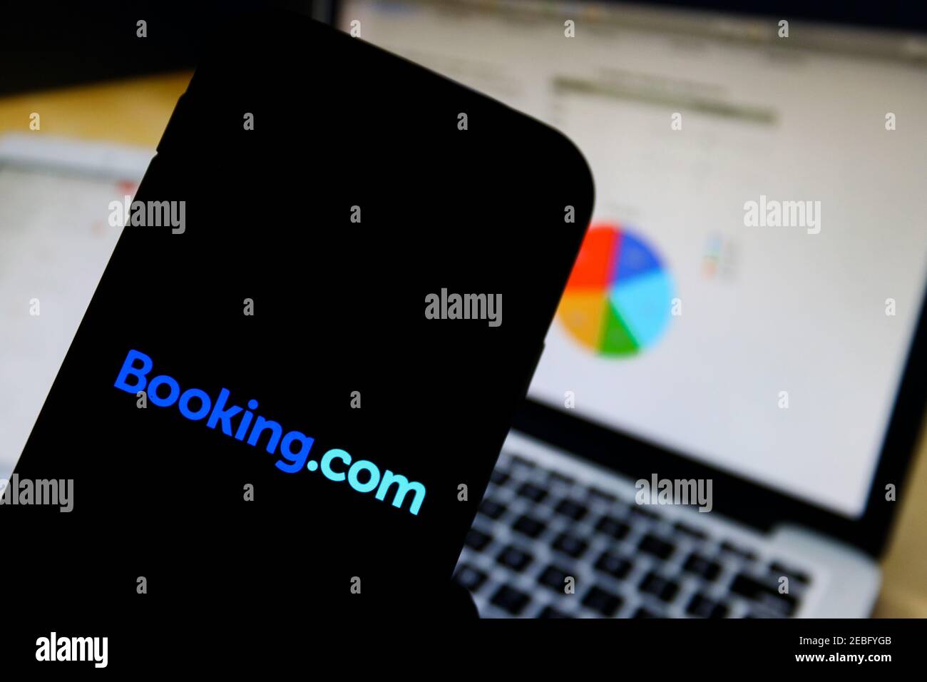 In this photo illustration a Booking.com app logo seen displayed on a ...