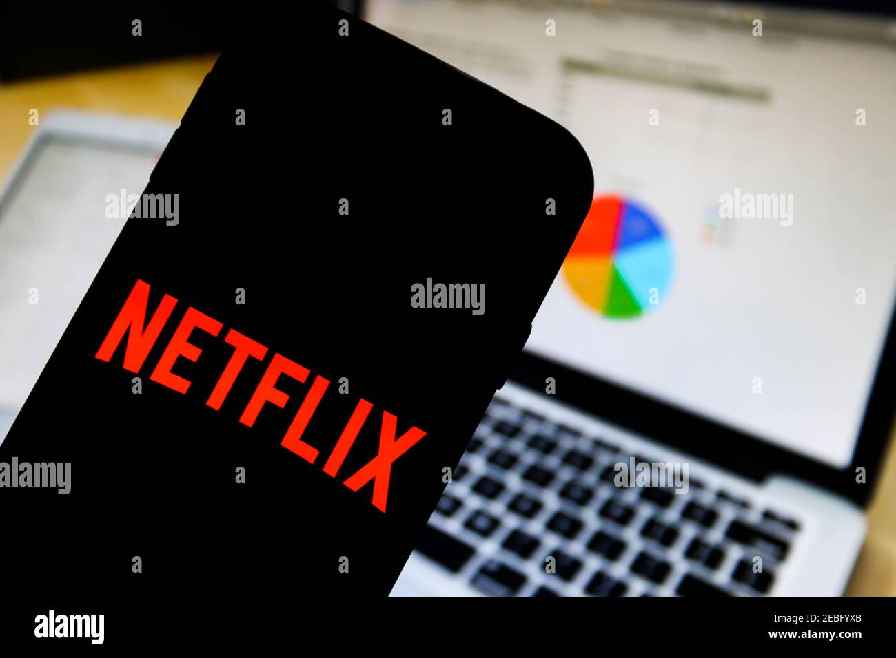 In this photo illustration a Netflix online streaming company app logo ...