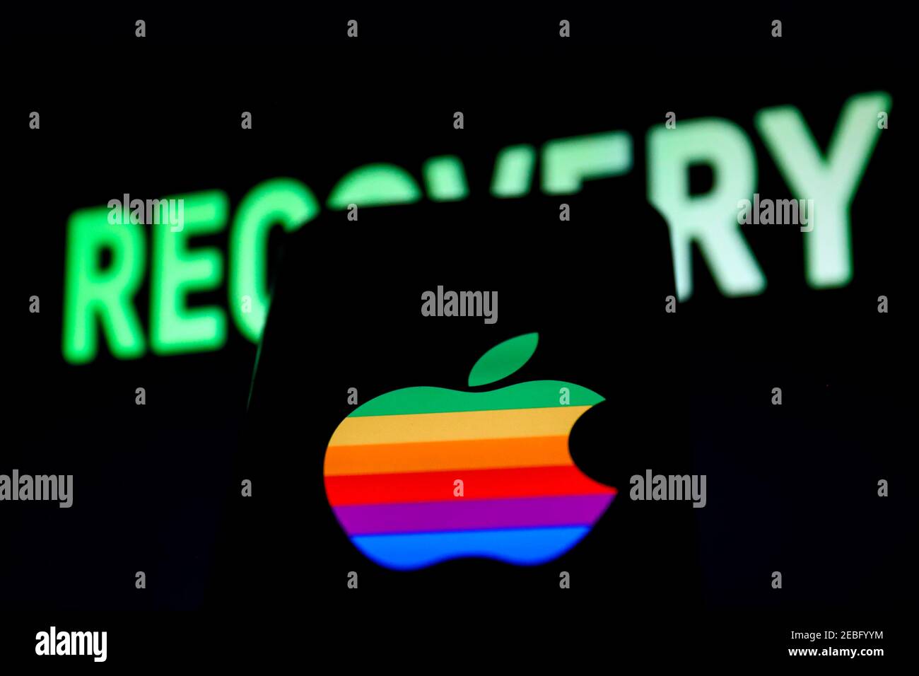 In this photo illustration an Apple technology company app logo seen ...