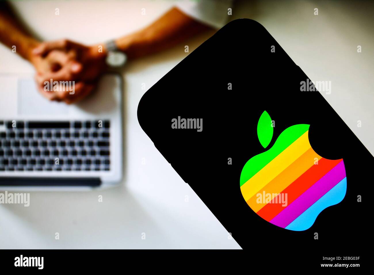 In this photo illustration an Apple technology company app logo seen ...