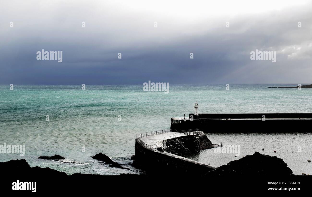 Coastal watchtower and the blue sea on a cloudy day Stock Photo - Alamy