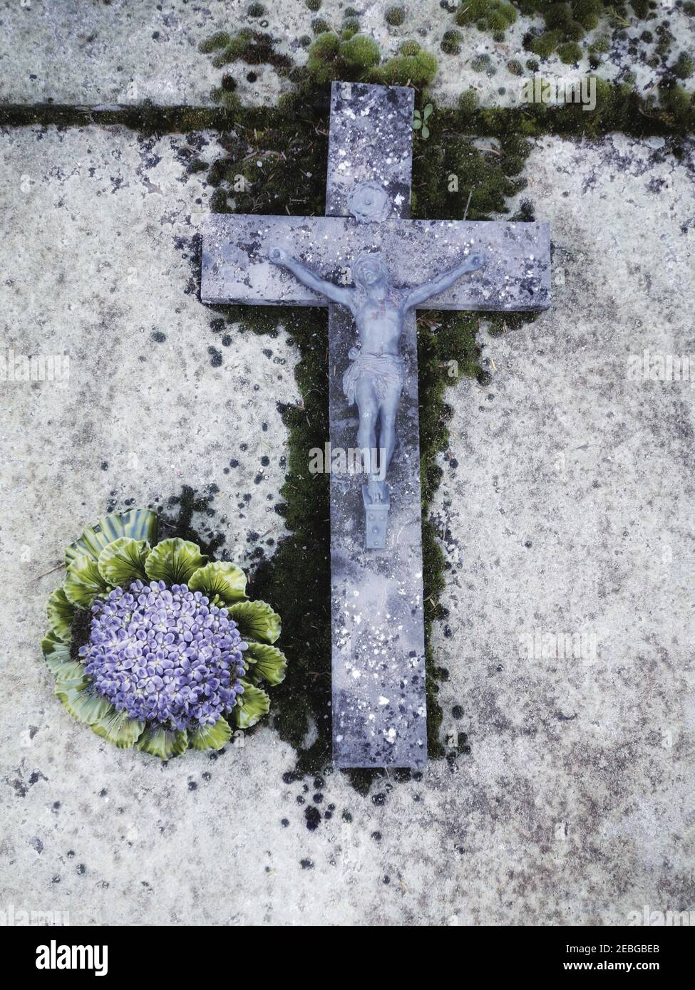 Top view of a cemetery cross and flowers on Stock Photo - Alamy