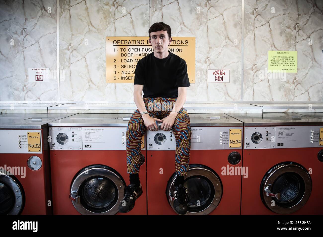 EXCLUSIVE: Alex Burty poses for photos before going on stage at Bush ...