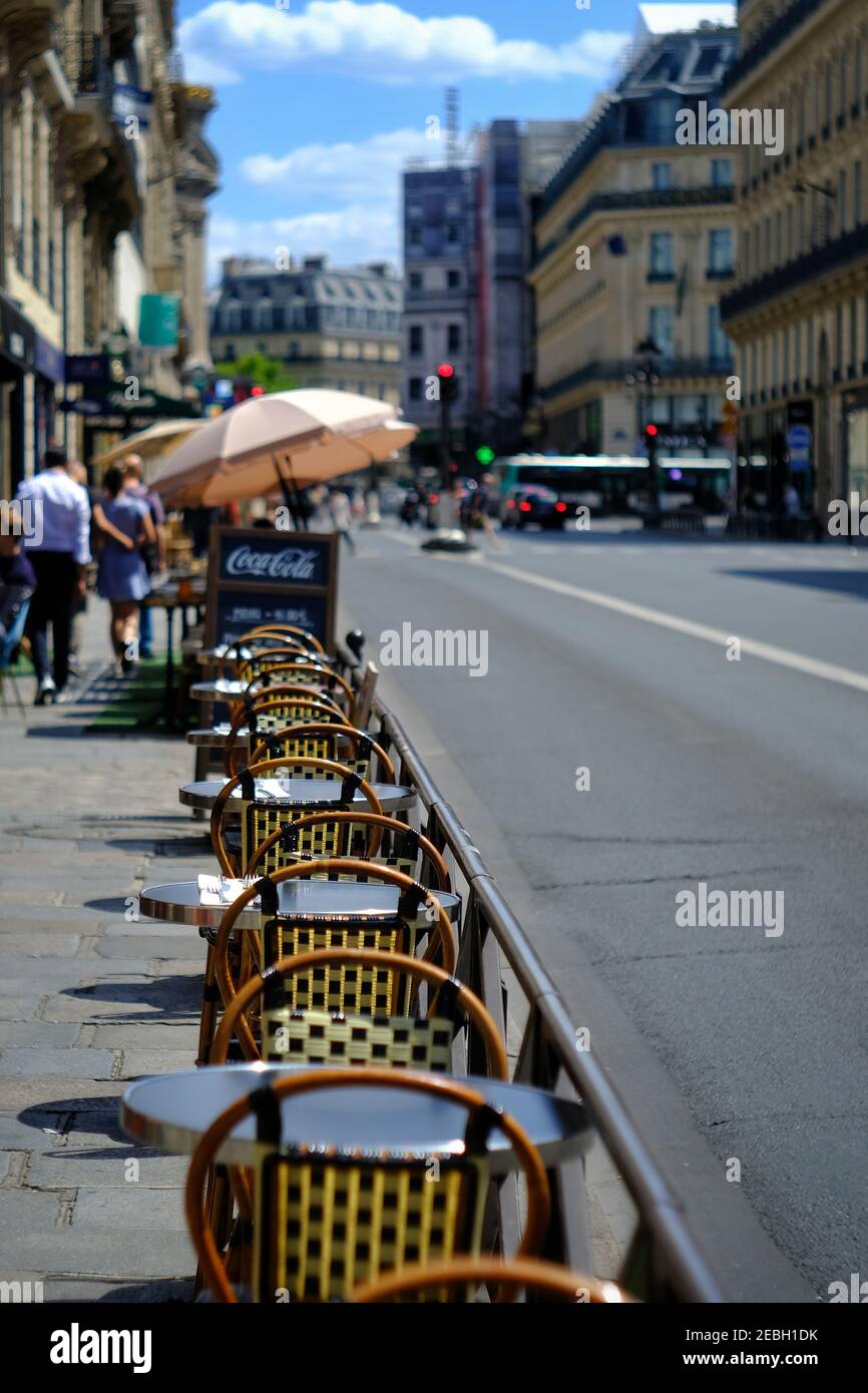 Paris, France - July 11, 2020 : A restaurants empty chairs and tables ...