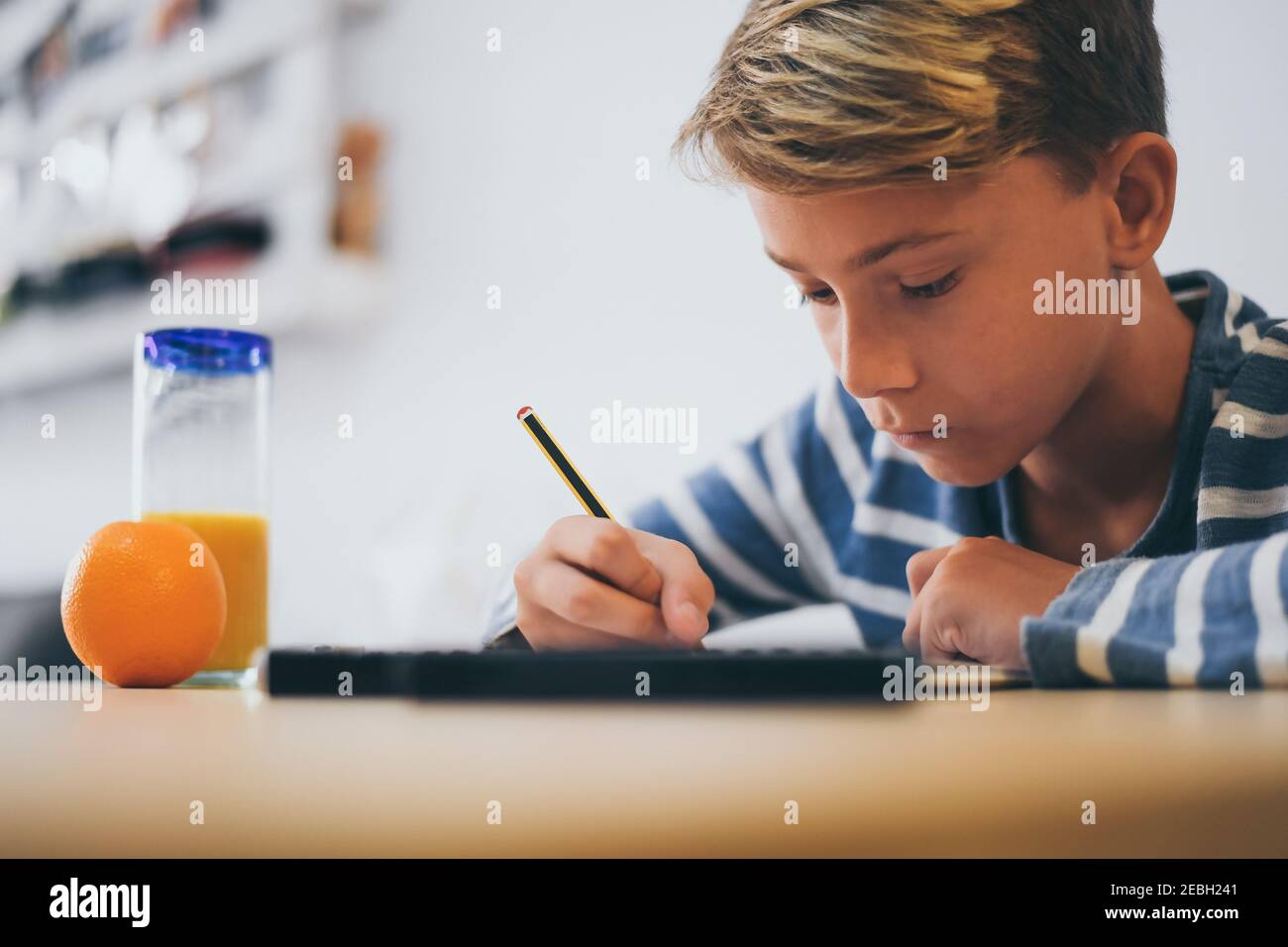 Student With Pencil On Desk High Resolution Stock Photography and ...