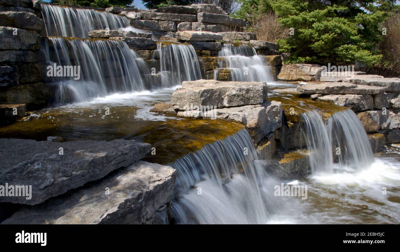 View of the waterfall in a public park. Beautiful, scenic, and very ...